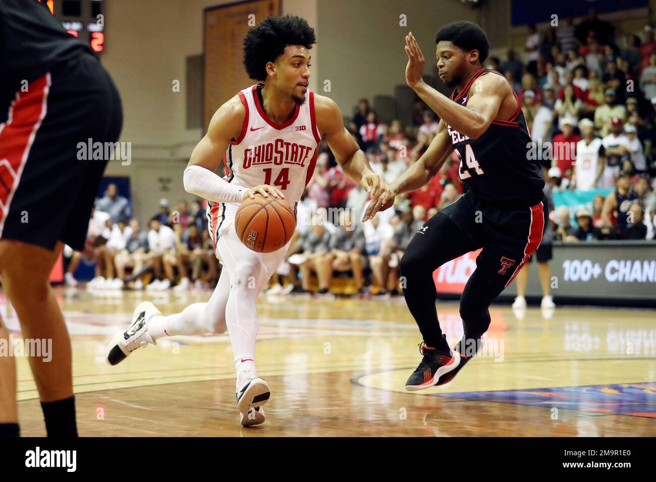 Texas Tech guard Kerwin Walton (24) tries to guard Ohio State forward ...