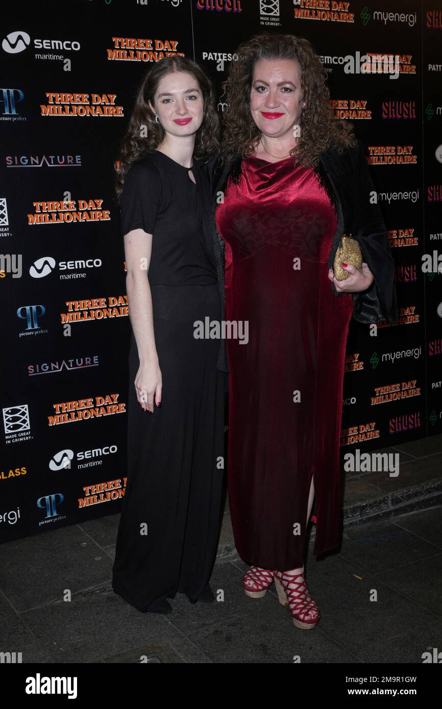 Grace Long, left, and Johanna Allit pose for photographers upon arrival ...