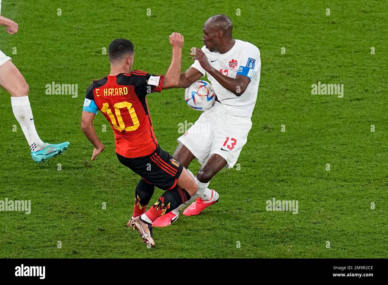 Belgium's Eden Hazard and Canada's Atiba Hutchinson challenge for the ...