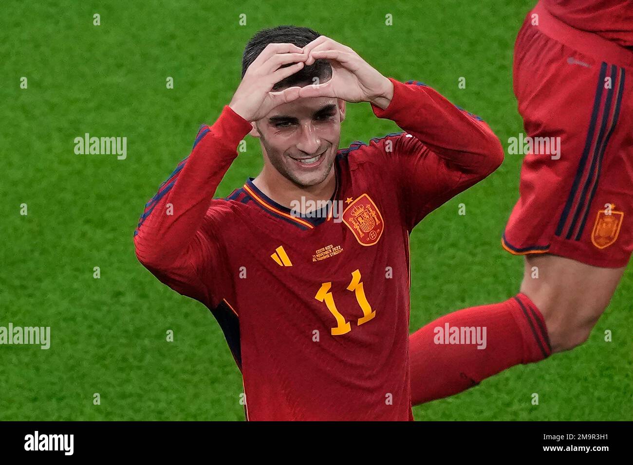Spain's Ferran Torres celebrates after scoring his side's third goal ...