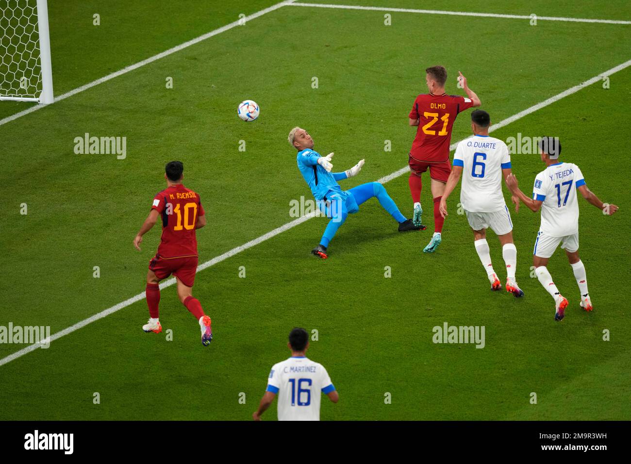 Spain's Dani Olmo, third right, scores his side's first goal during the ...