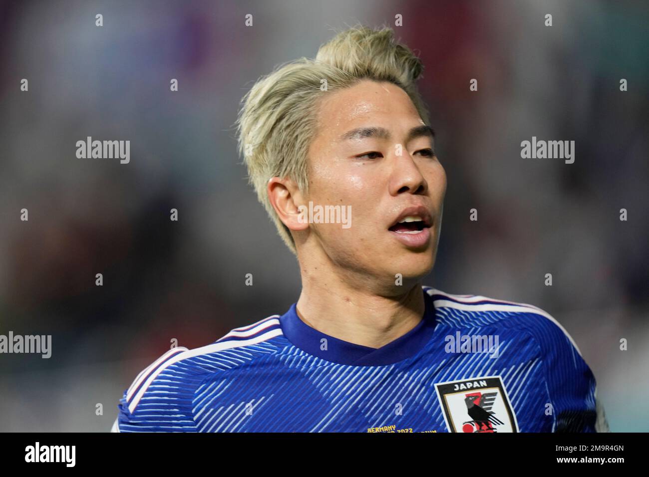 Japan's Takuma Asano celebrates after scoring his side's second goal ...