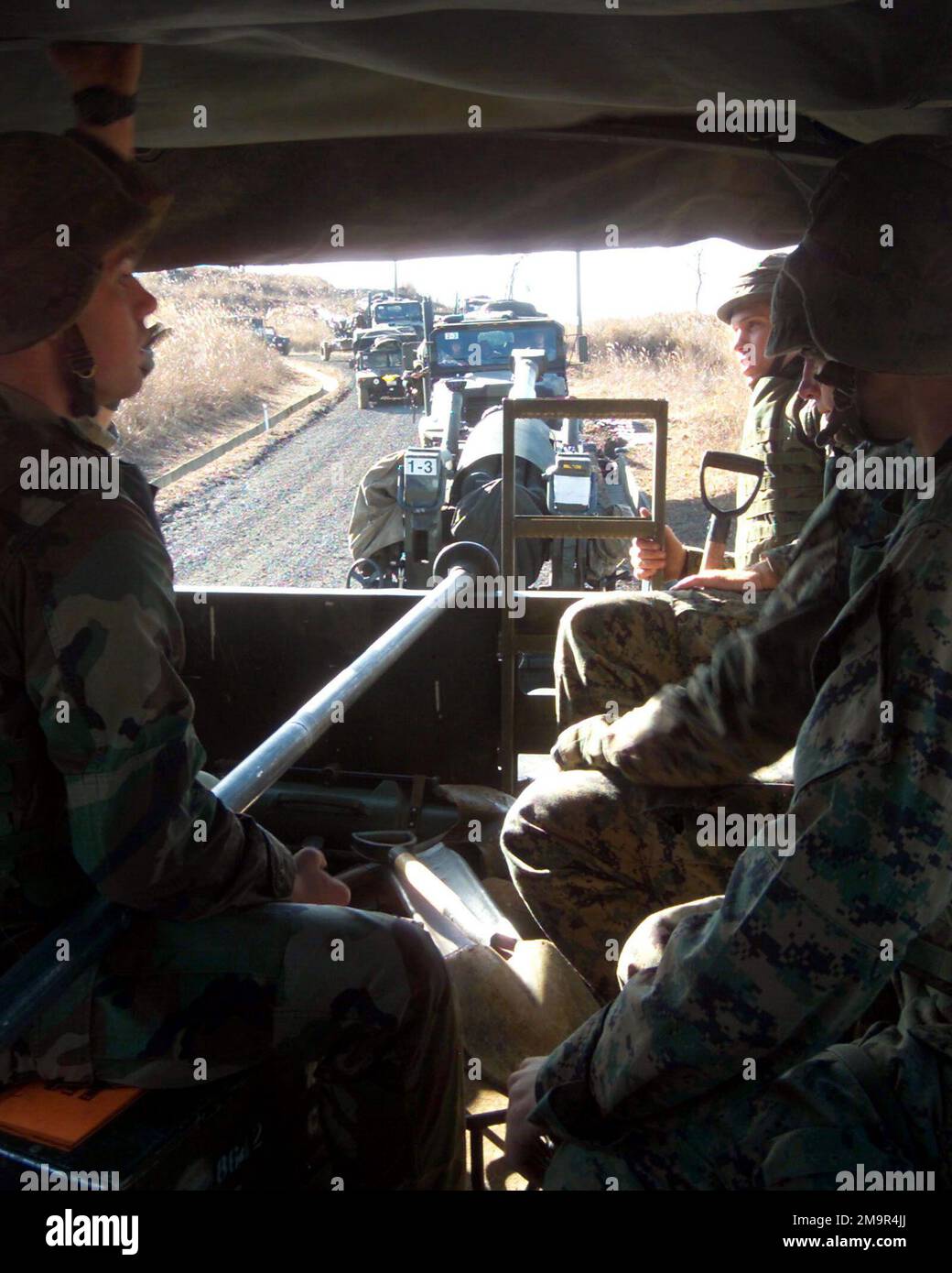 031126-M-4711R-014. US Marine Corps (USMC) Marines from Tango Battery ...