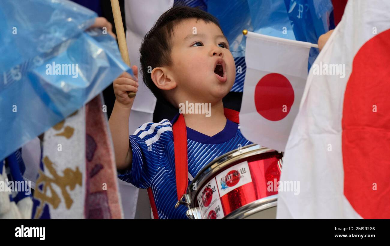 A Japanese boy cheers ahead of the World Cup group E soccer match ...