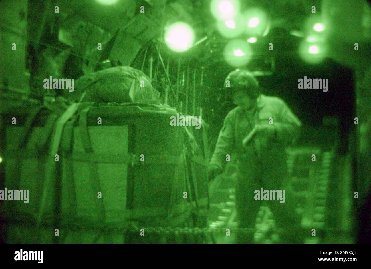 US Air Force (USAF) MASTER Sergeant (MSGT) Steve Lewis, a Loadmaster ...