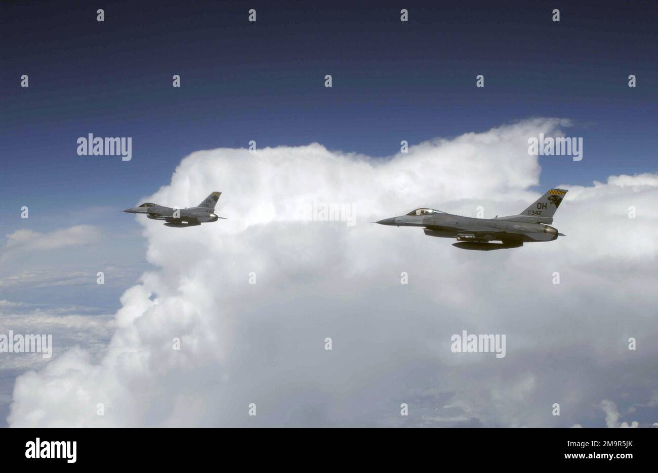 A pair of US Air Force (USAF) F-16C Fighting Falcons from the 162nd ...