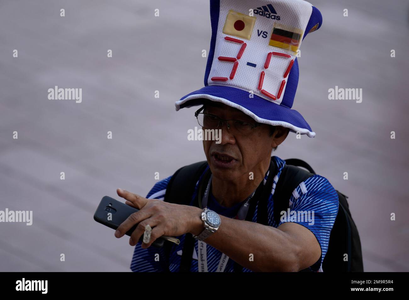 A Japan supporter cheers prior to the World Cup group E soccer match ...