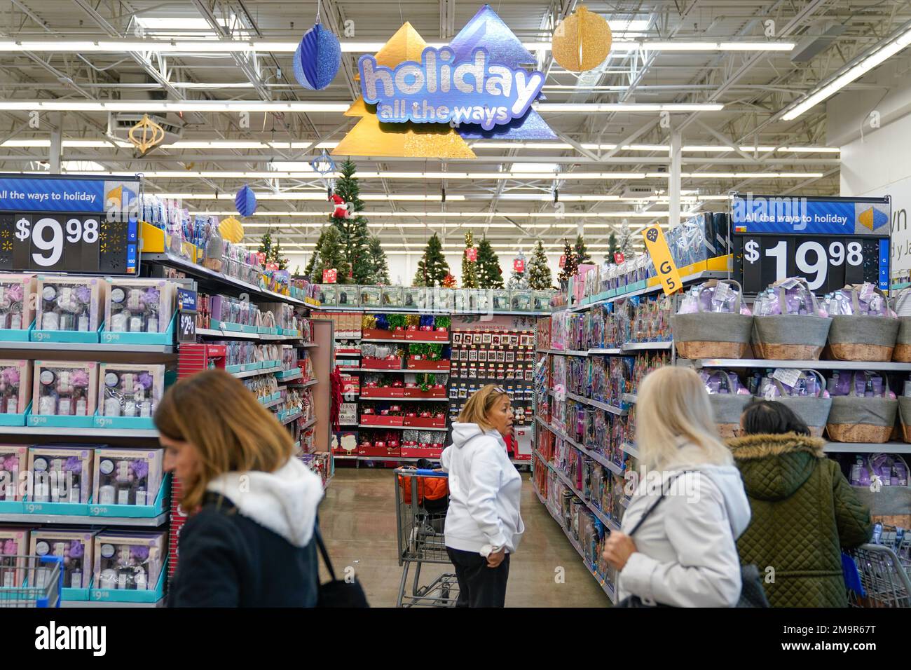 People shop at a Walmart in Secaucus, N.J., Tuesday, Nov. 22, 2022 ...
