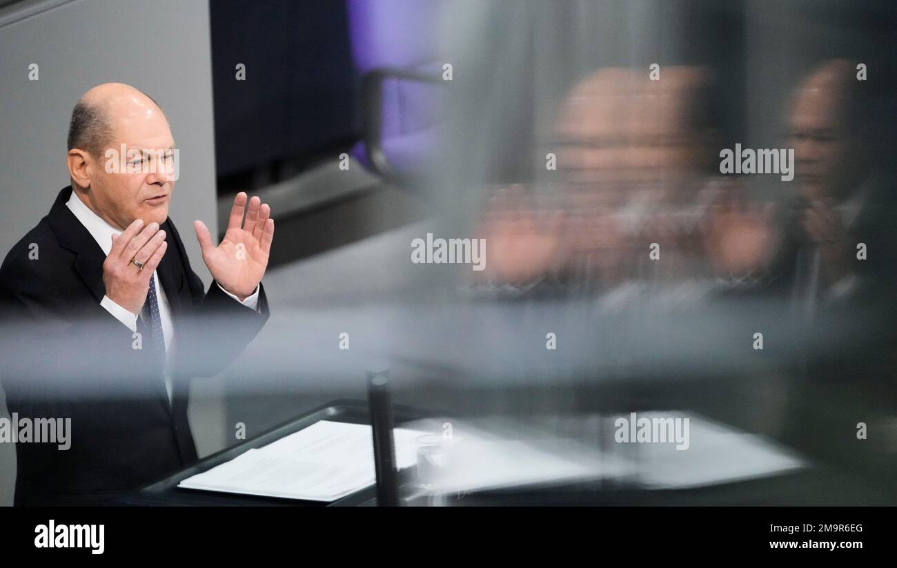 German Chancellor Olaf Scholz delivers a speech during the debate at ...
