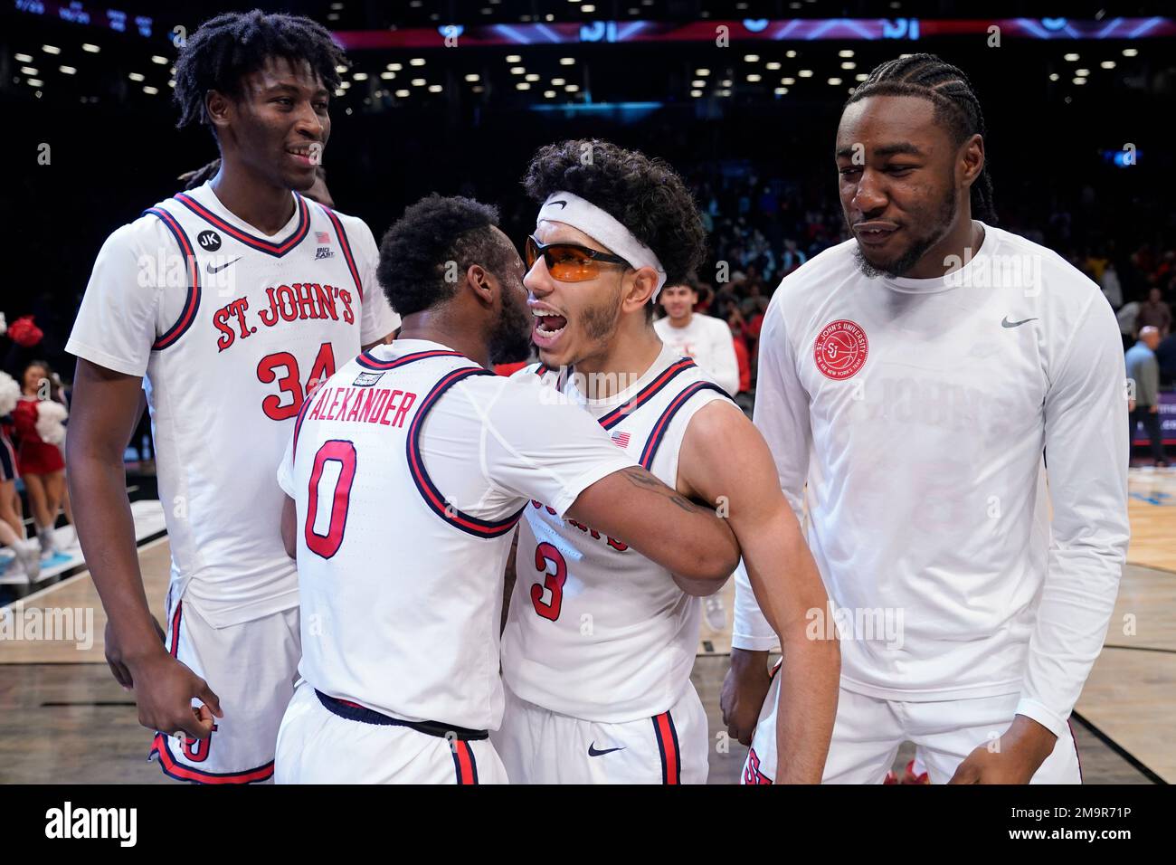 St. John's Andre Curbelo (3) celebrates with Posh Alexander (0) after ...