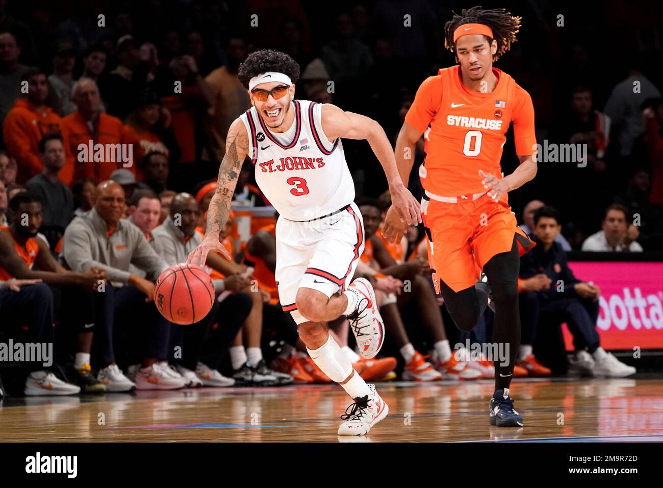 St. John's Andre Curbelo (3) smiles as he breaks away on a steal in ...