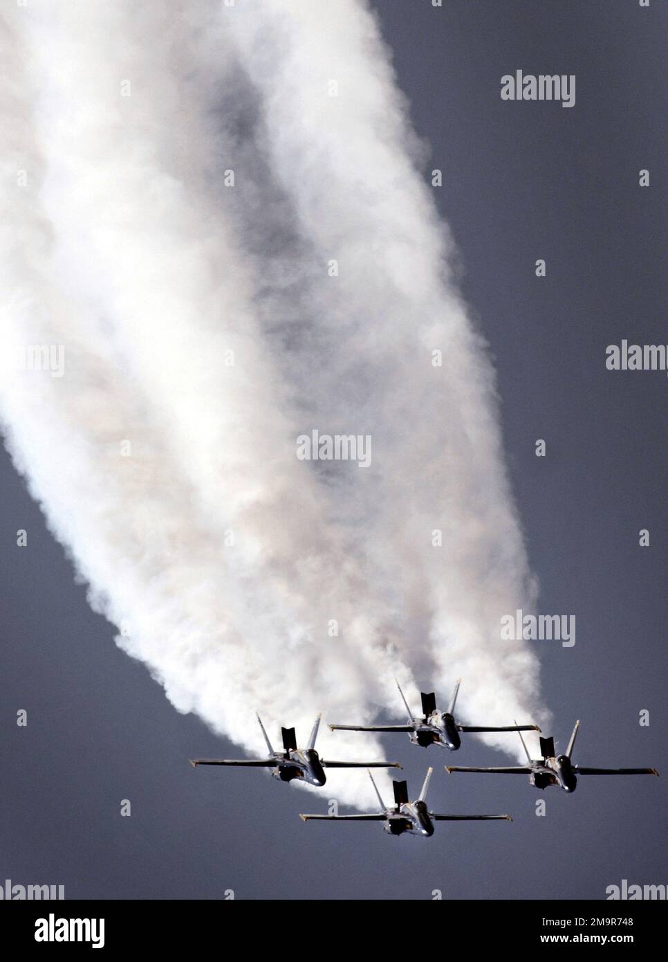 Four US Navy (USN) Blue Angels F/A-18C Hornet aerial demonstration team ...