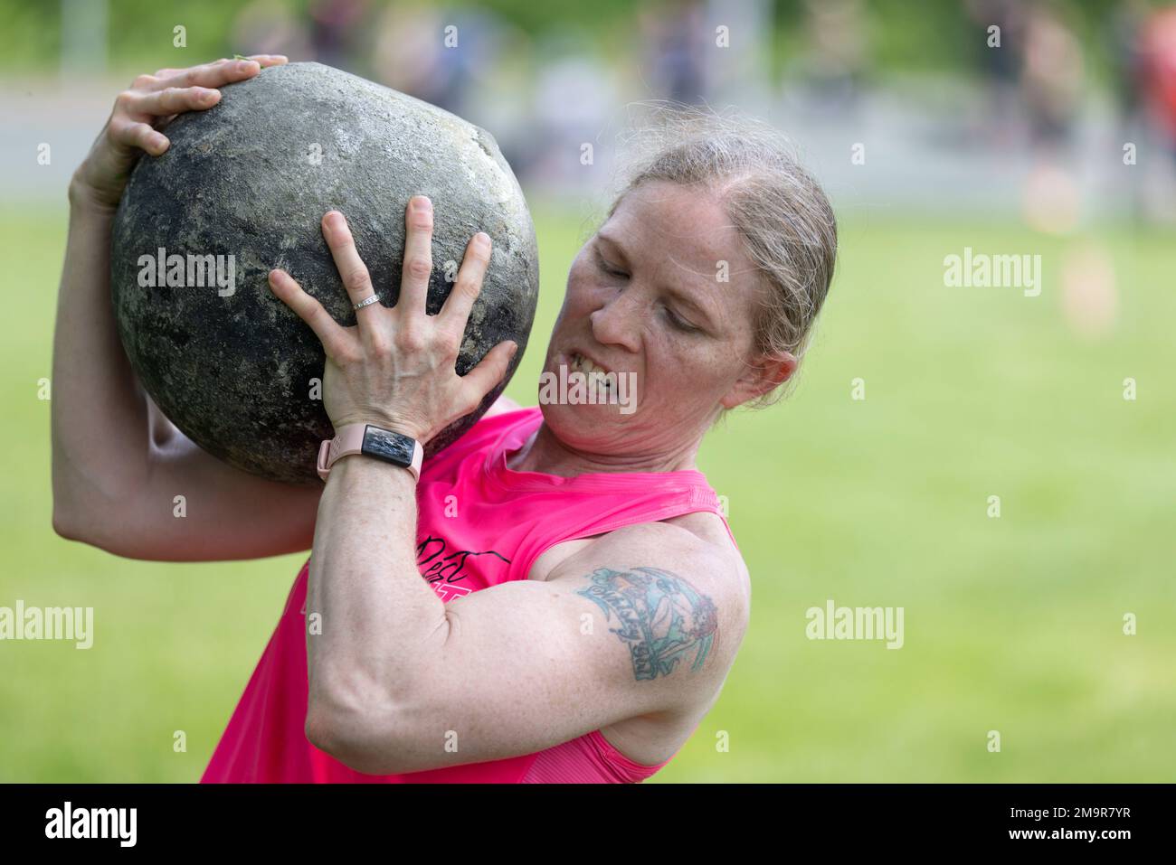 SGT Cynthia Jarvi lifting the Atlas Stones for the WRAIR Strongman and ...