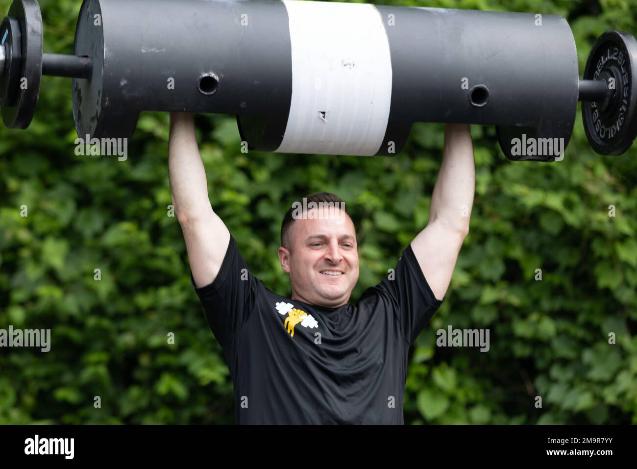 SSG Dalton Carrington lifting the Log Press for the WRAIR Strongman and ...