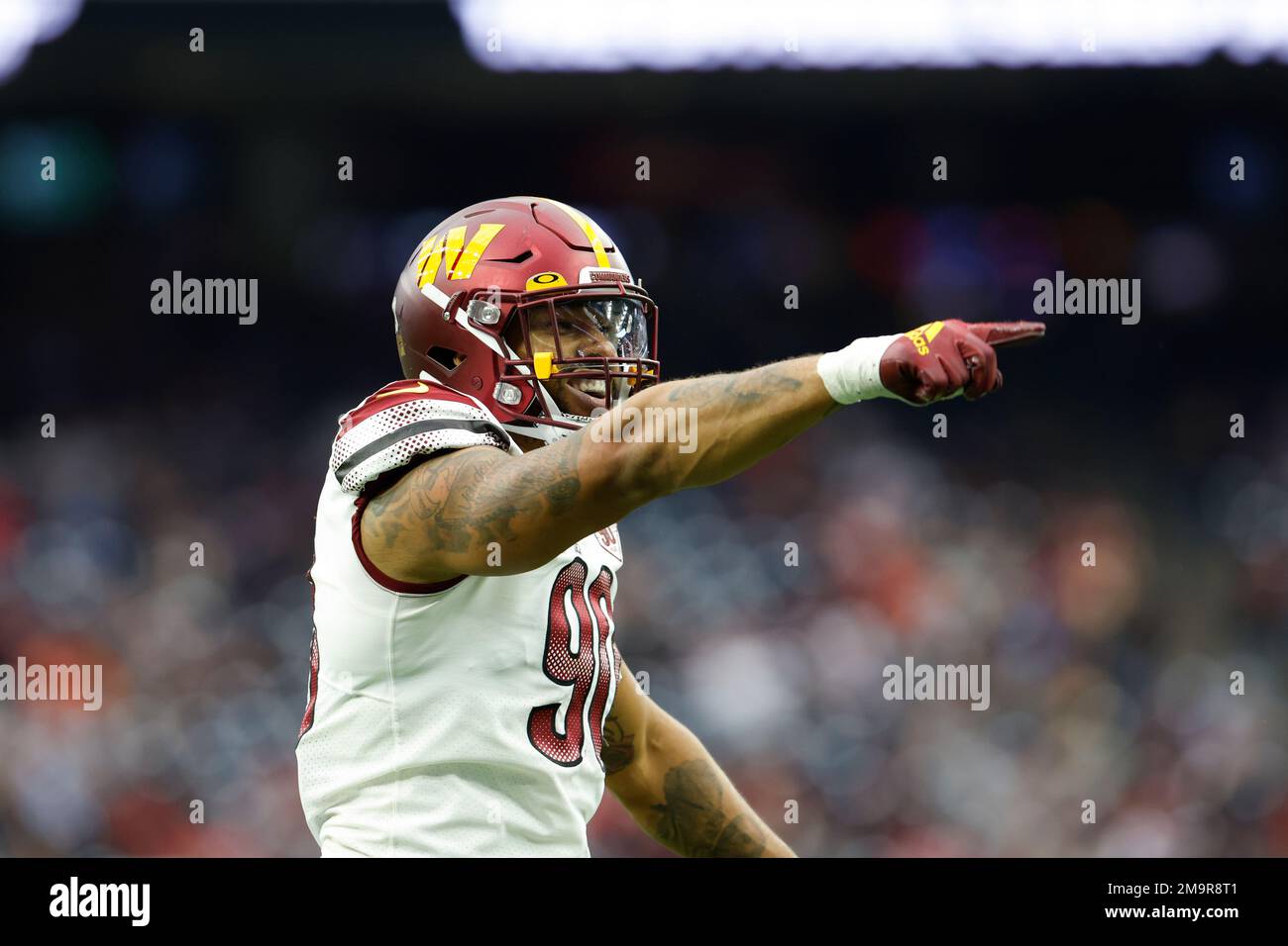 Washington Commanders defensive end Montez Sweat (90) celebrates during ...
