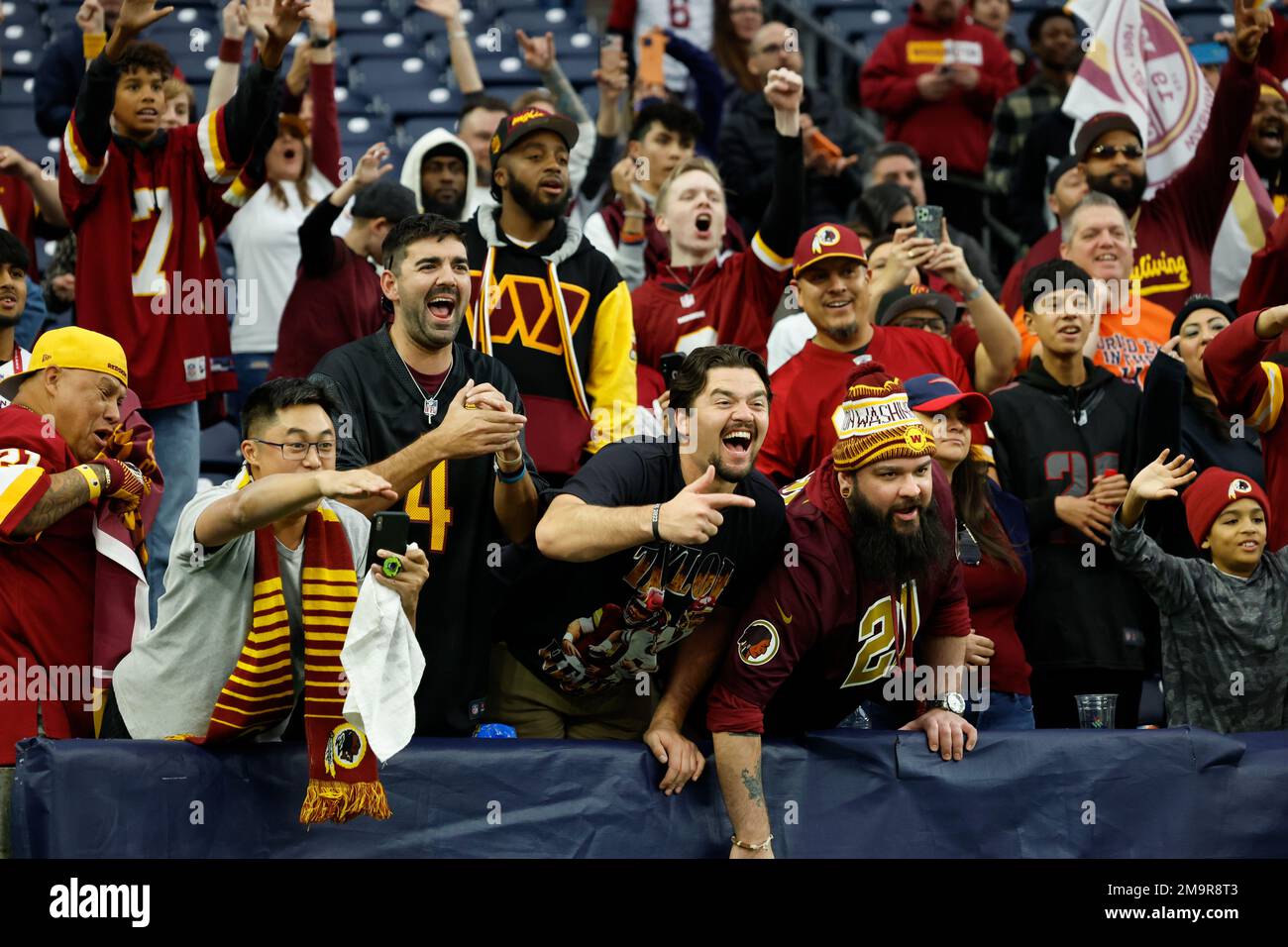 Washington Commanders fans cheer after an NFL game against the Houston ...