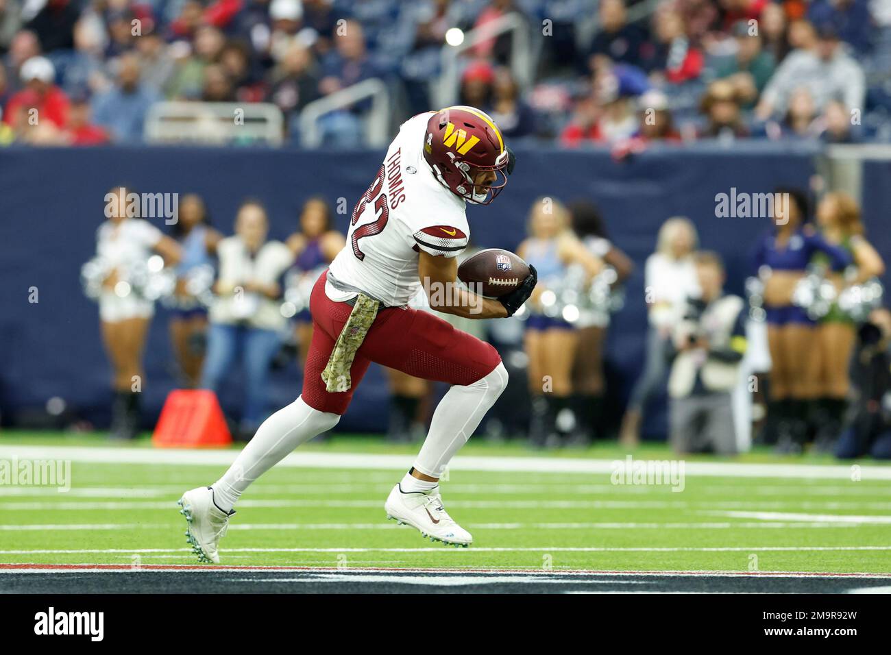 Washington Commanders tight end Logan Thomas (82) carries the ball ...