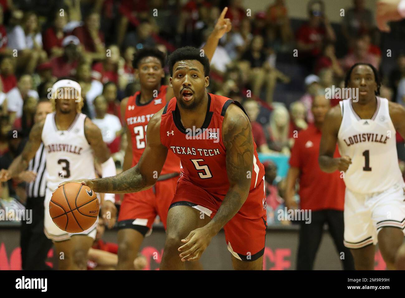 Texas Tech forward KJ Allen (5) dribbles against Louisville during the ...