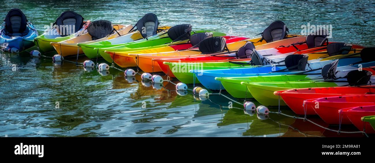 Colorful canoes on beach. Hawaii the big island Stock Photo - Alamy