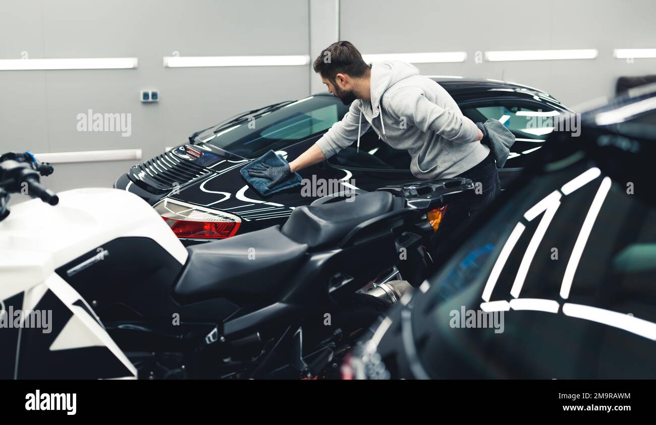 Process of car detailing - applying ceramic coating - done by male ...