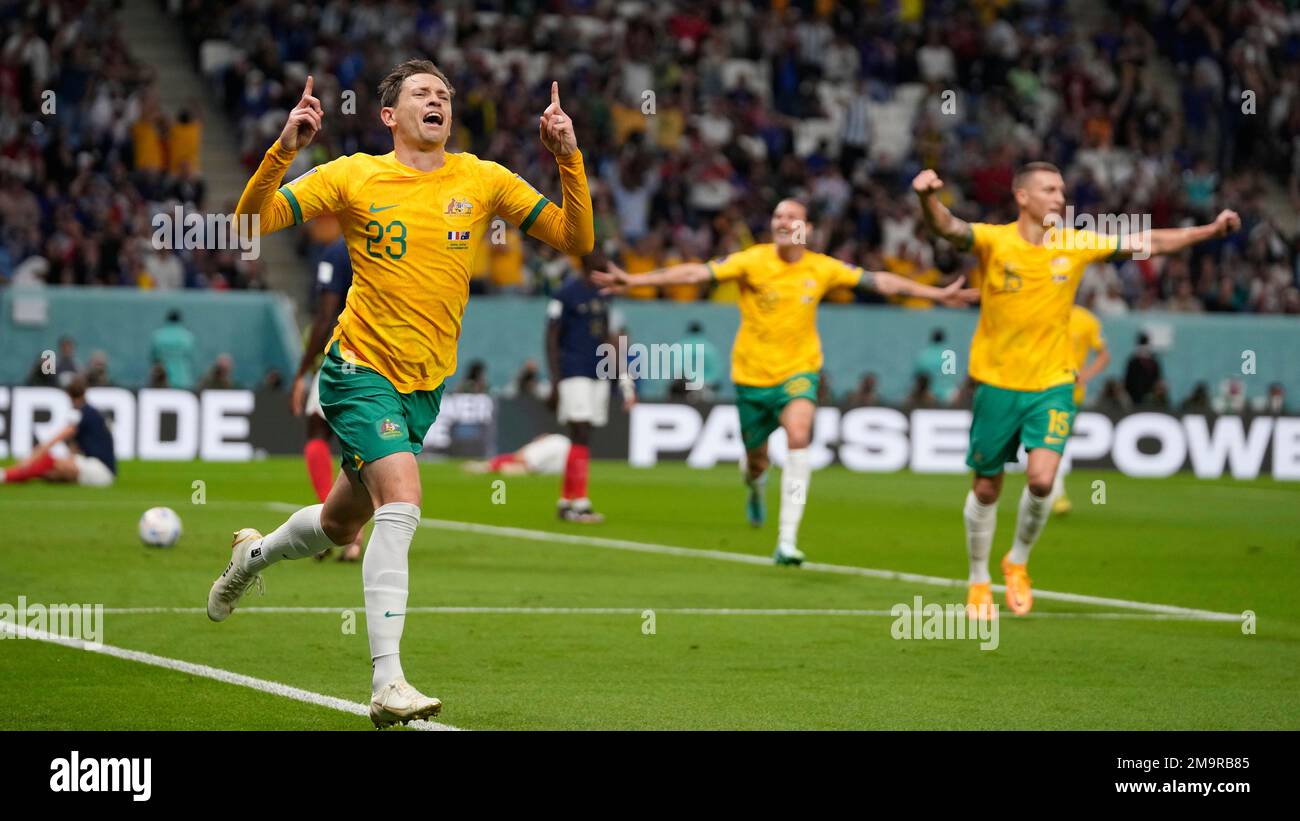 Australia's Craig Goodwin, left, celebrates after scoring a goal during ...