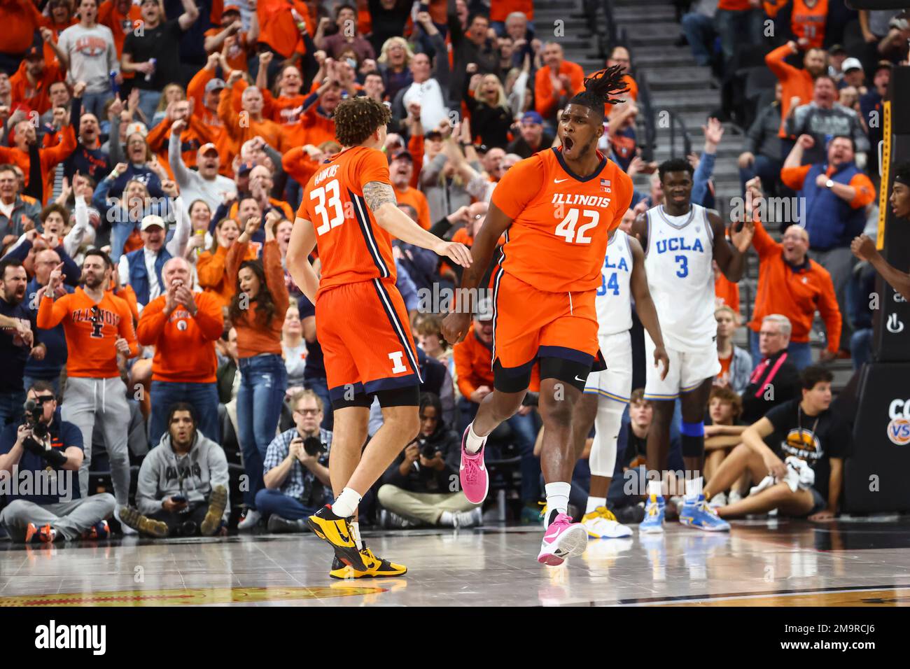 Illinois forward Dain Dainja (42) celebrates a basket against UCLA ...
