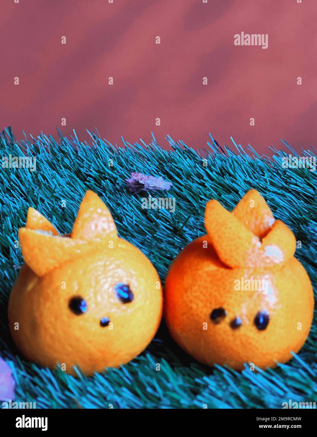 The animals faces decorations made of fruits Stock Photo - Alamy