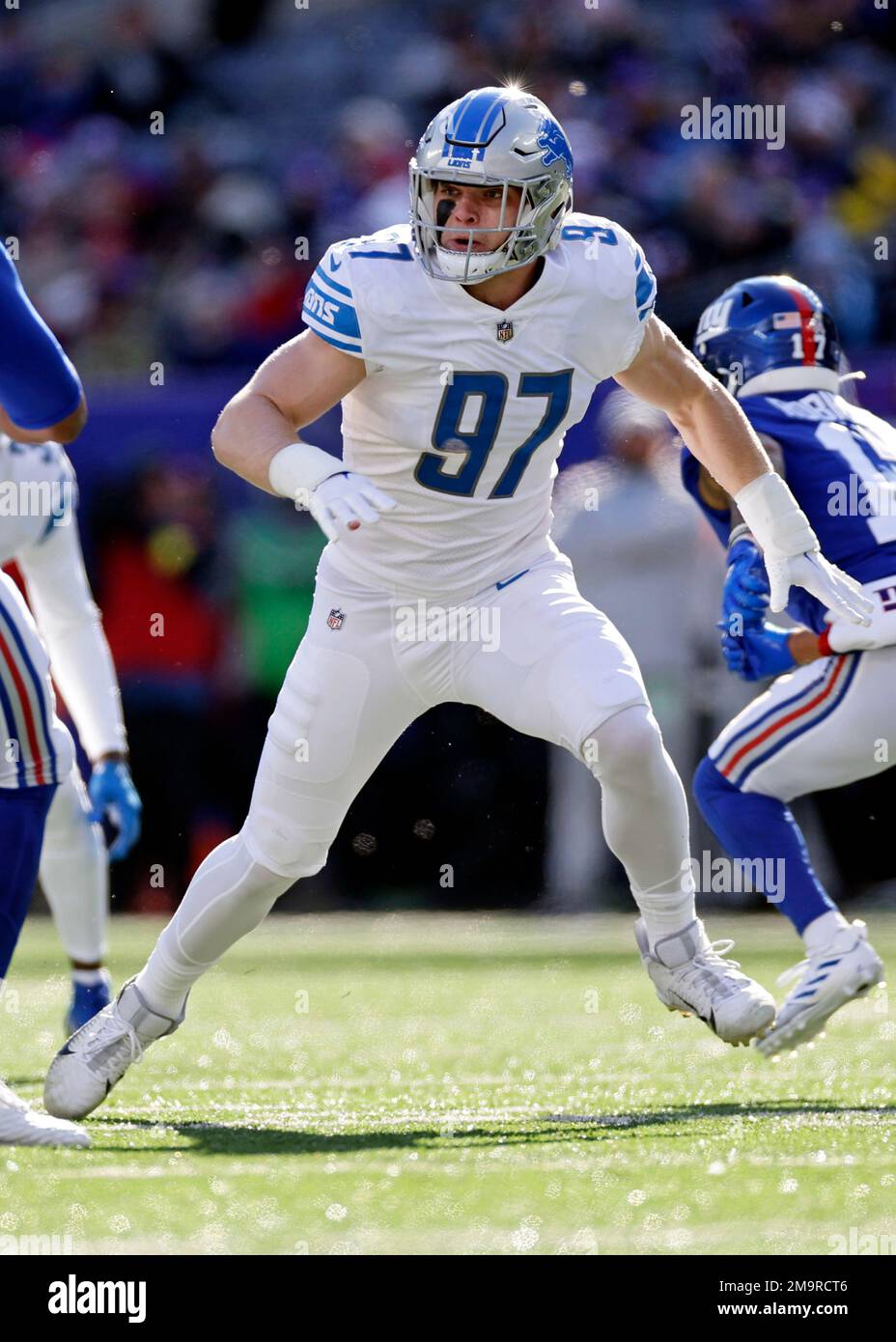 Detroit Lions defensive end Aidan Hutchinson (97) defends New York ...