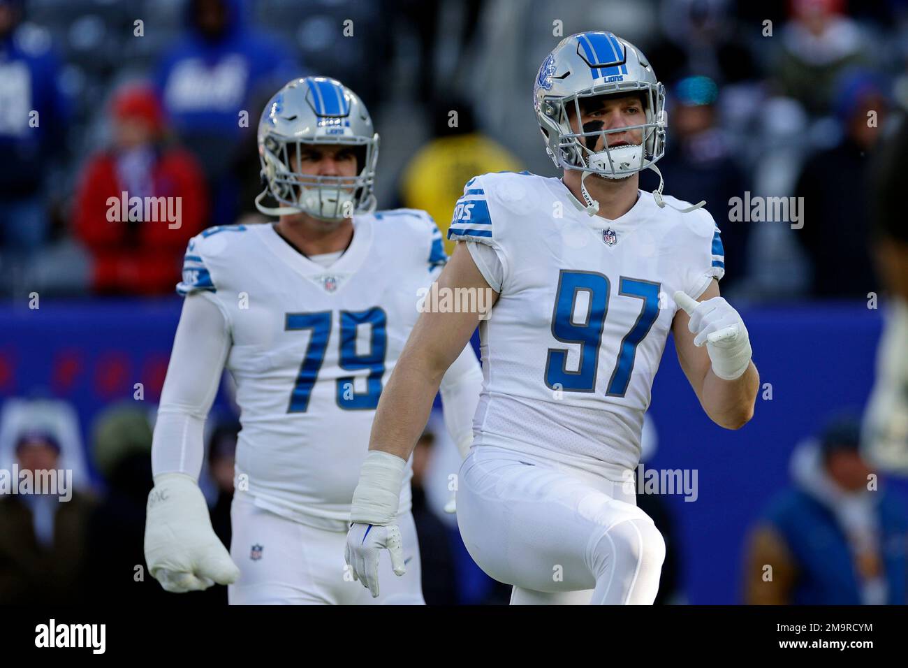 Detroit Lions defensive end Aidan Hutchinson (97) warms up before an ...