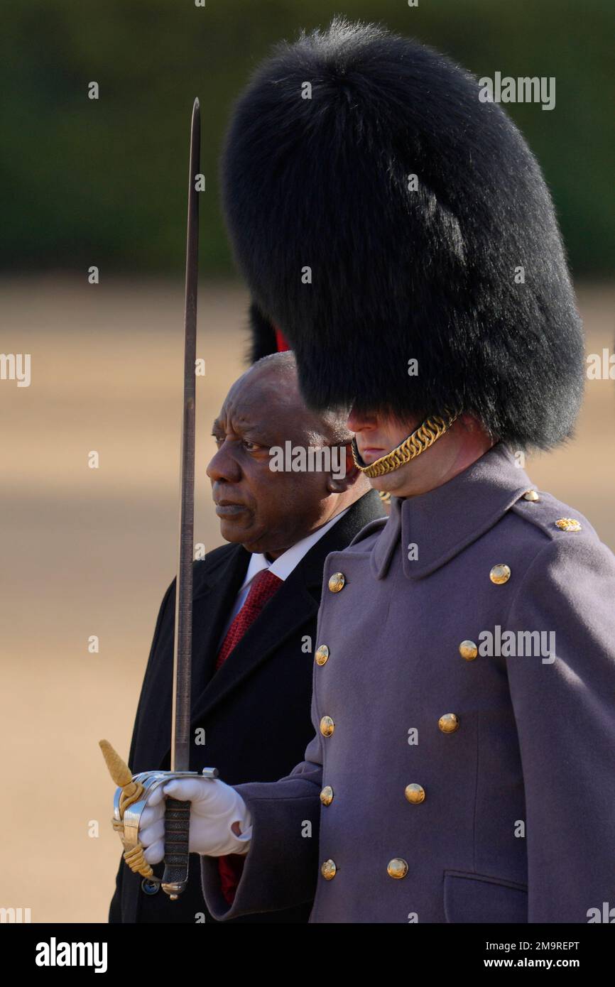 President of South Africa Cyril Ramaphosa walks through soldiers at a ...