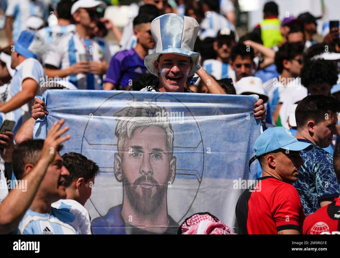 Argentina's fans hold a picture of Lionel Messi prior the World Cup ...