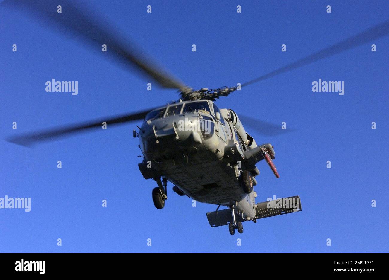 A US Navy (USN) HH-60F Seahawk helicopter assigned to Helicopter Anti ...