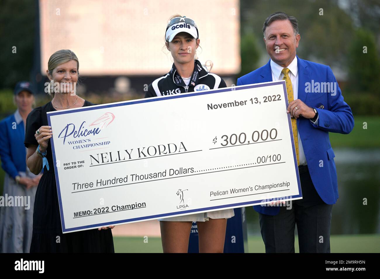 Nelly Korda poses with Raymond James Bank Chairman and CEO Steve Raney ...
