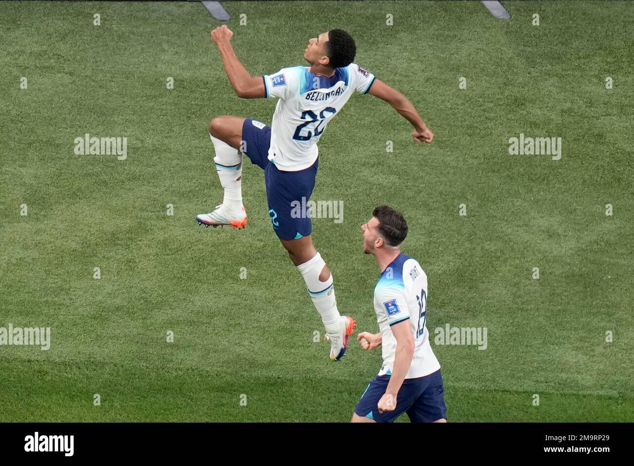 England's Jude Bellingham, left, celebrates after scoring his side's ...