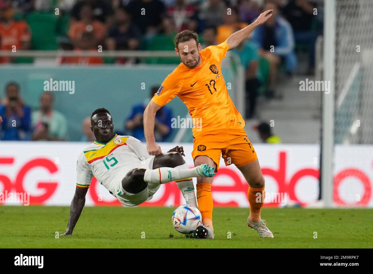 Daley Blind of the Netherlands, left, is challenged by Senegal's Krepin ...