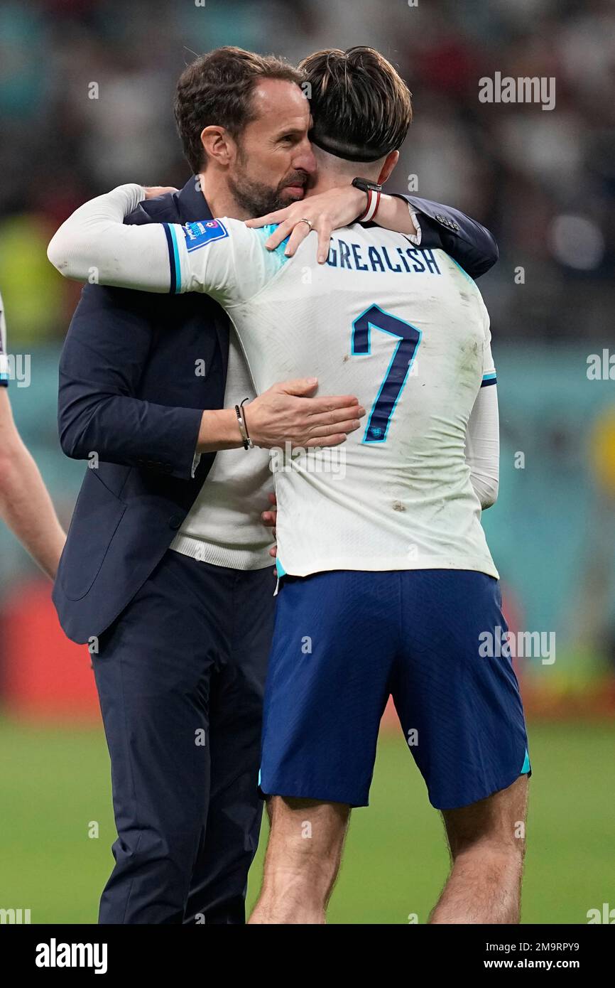 England's Jack Grealish, right, hugs head coach Gareth Southgate after their win in the World ...