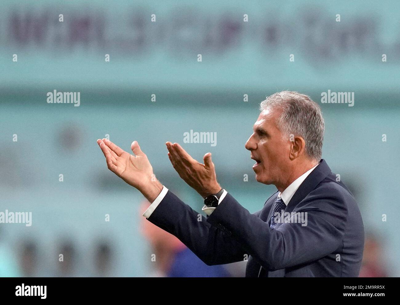 Iran's head coach Carlos Queiroz encourages fan noice during the World ...
