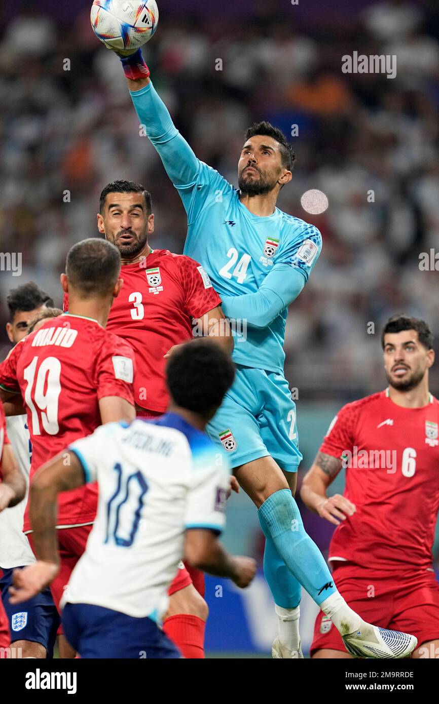 Iran's goalkeeper Hossein Hosseini reaches out for the ball during the ...