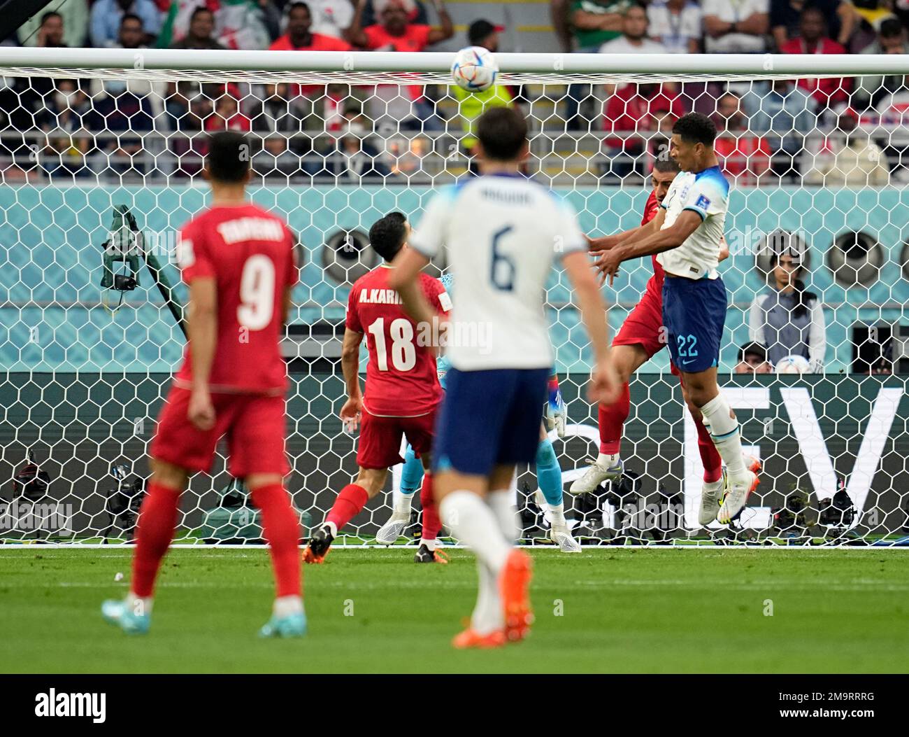 England's Jude Bellingham, right, scores his side's first goal during ...