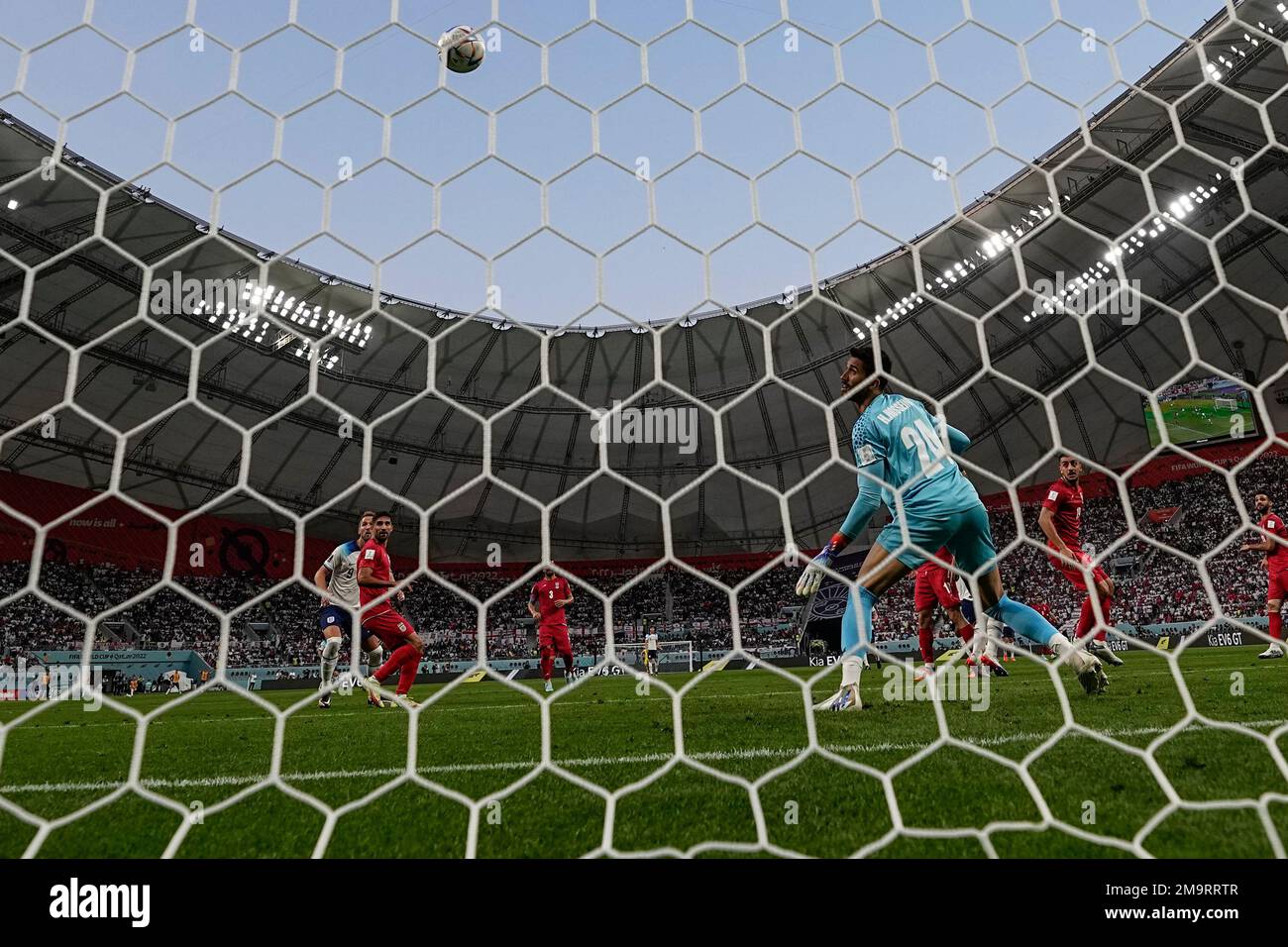 CORRECTS NAME OF GOALKEEPER - Iran's goalkeeper Hossein Hosseini looks ...