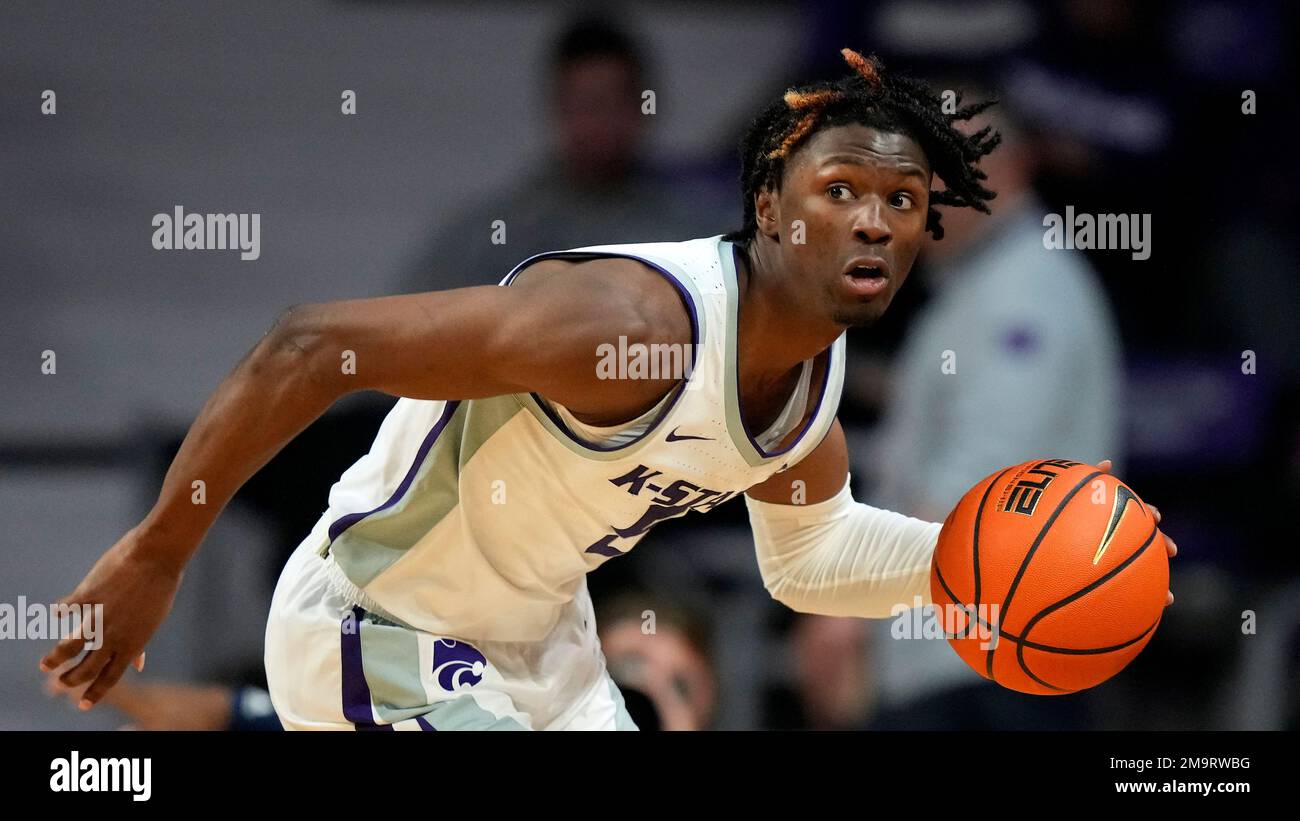 Kansas State guard Cam Carter drives during the second half of an NCAA ...