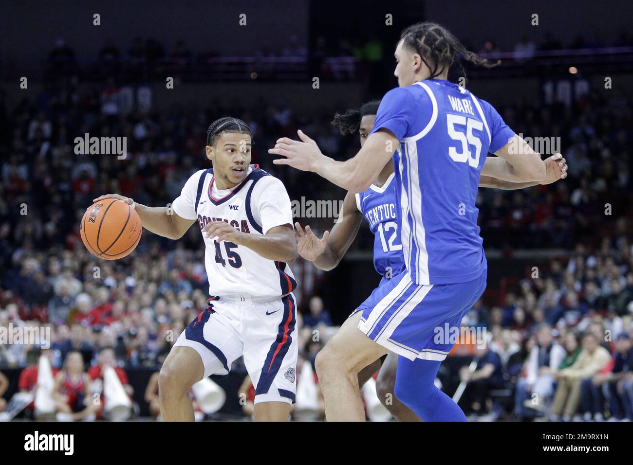 Kentucky forward Lance Ware (55) and guard Antonio Reeves (12) double ...