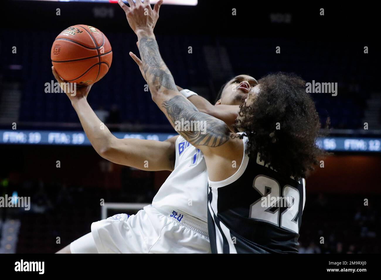 St. Louis' Yuri Collins, left, against Providence's Devin Carter, right ...