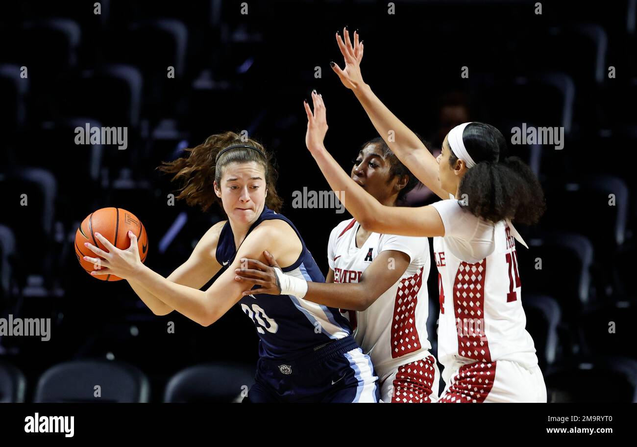 Villanova forward Maddy Siegrist, left, tries to get past Temple ...