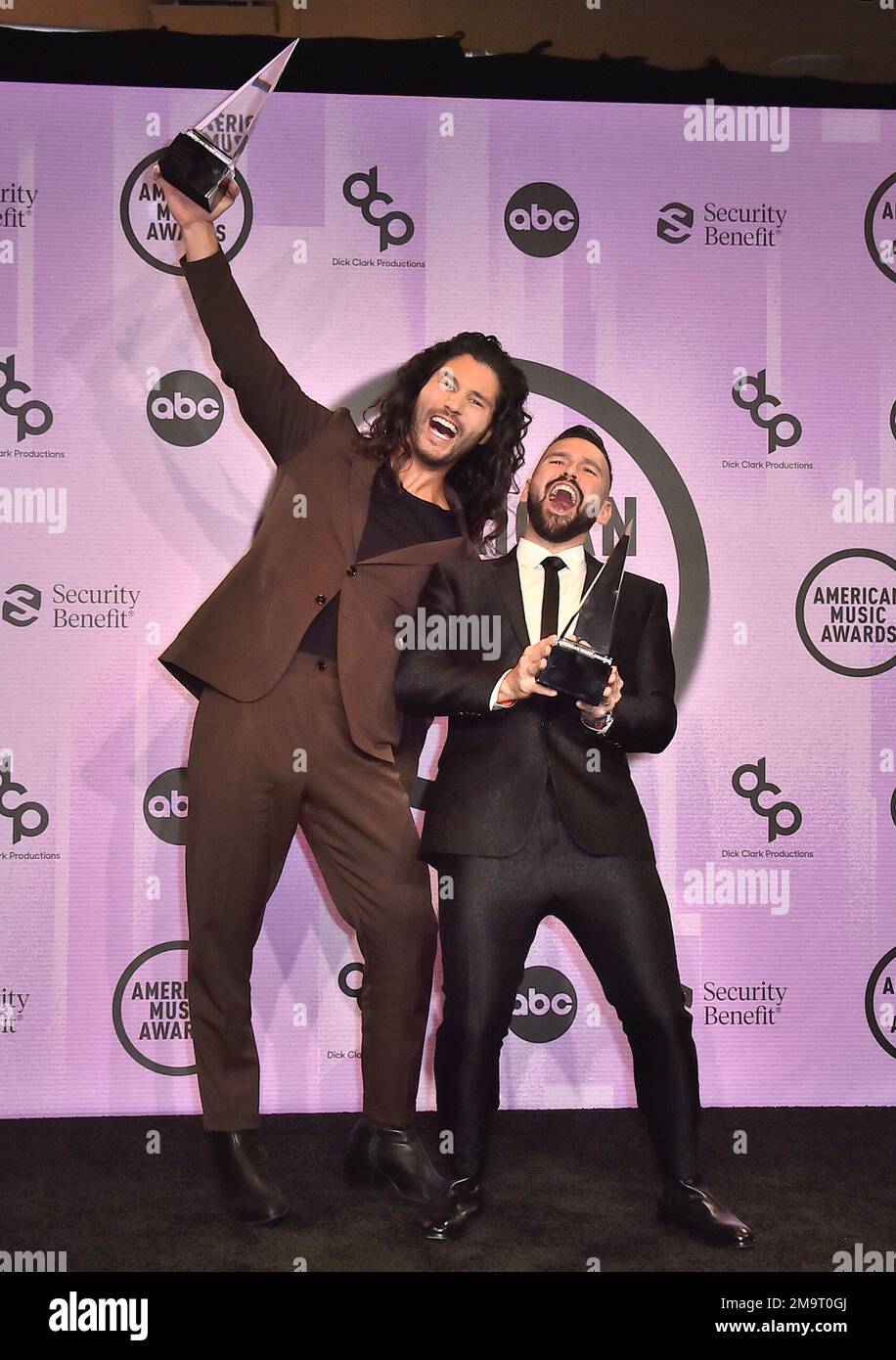 Dan Smyers, left, and Shay Mooney of Dan + Shay pose in the press room ...