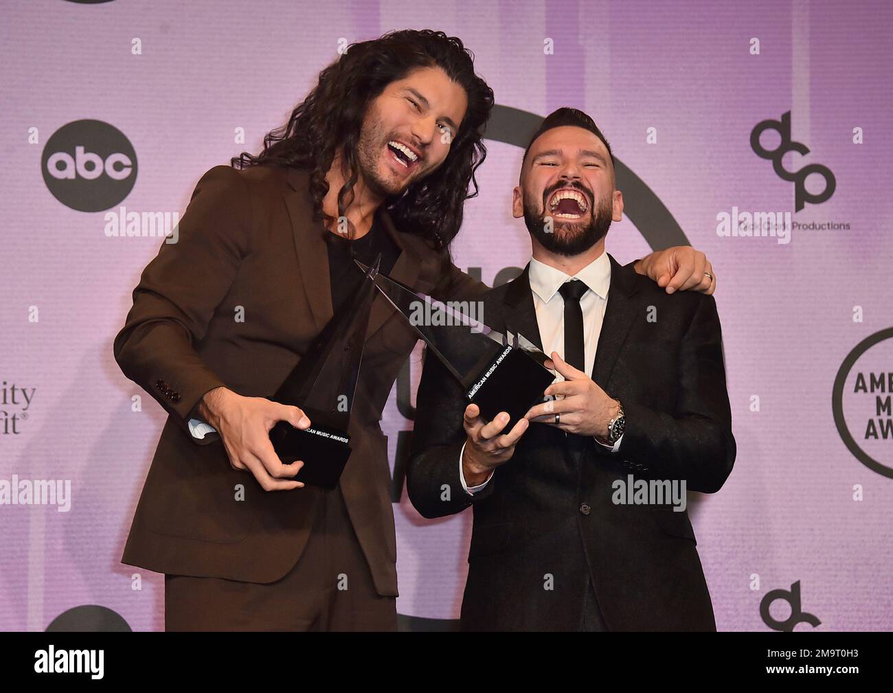 Dan Smyers, left, and Shay Mooney of Dan + Shay pose in the press room ...