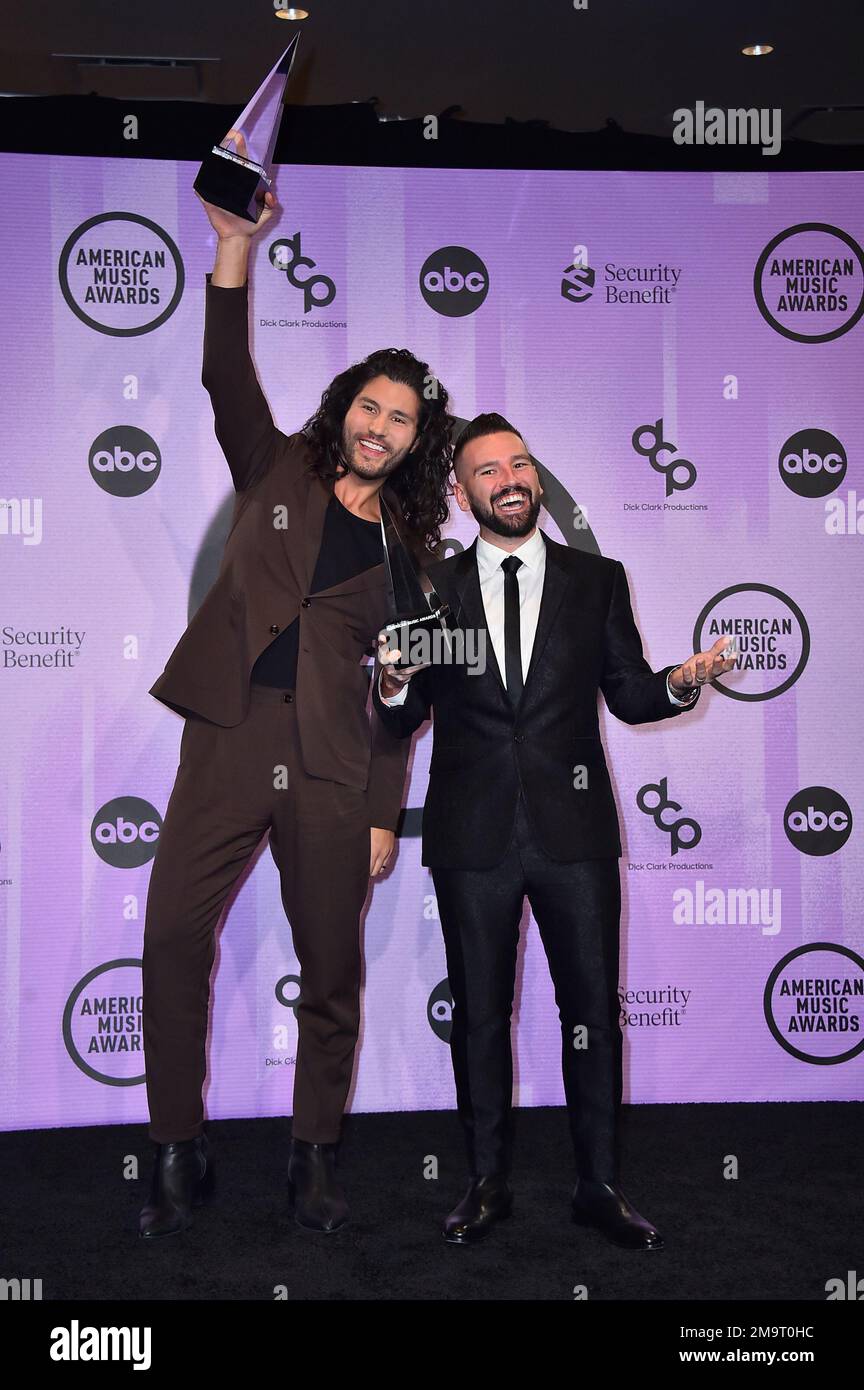 Dan Smyers, left, and Shay Mooney of Dan + Shay pose in the press room ...