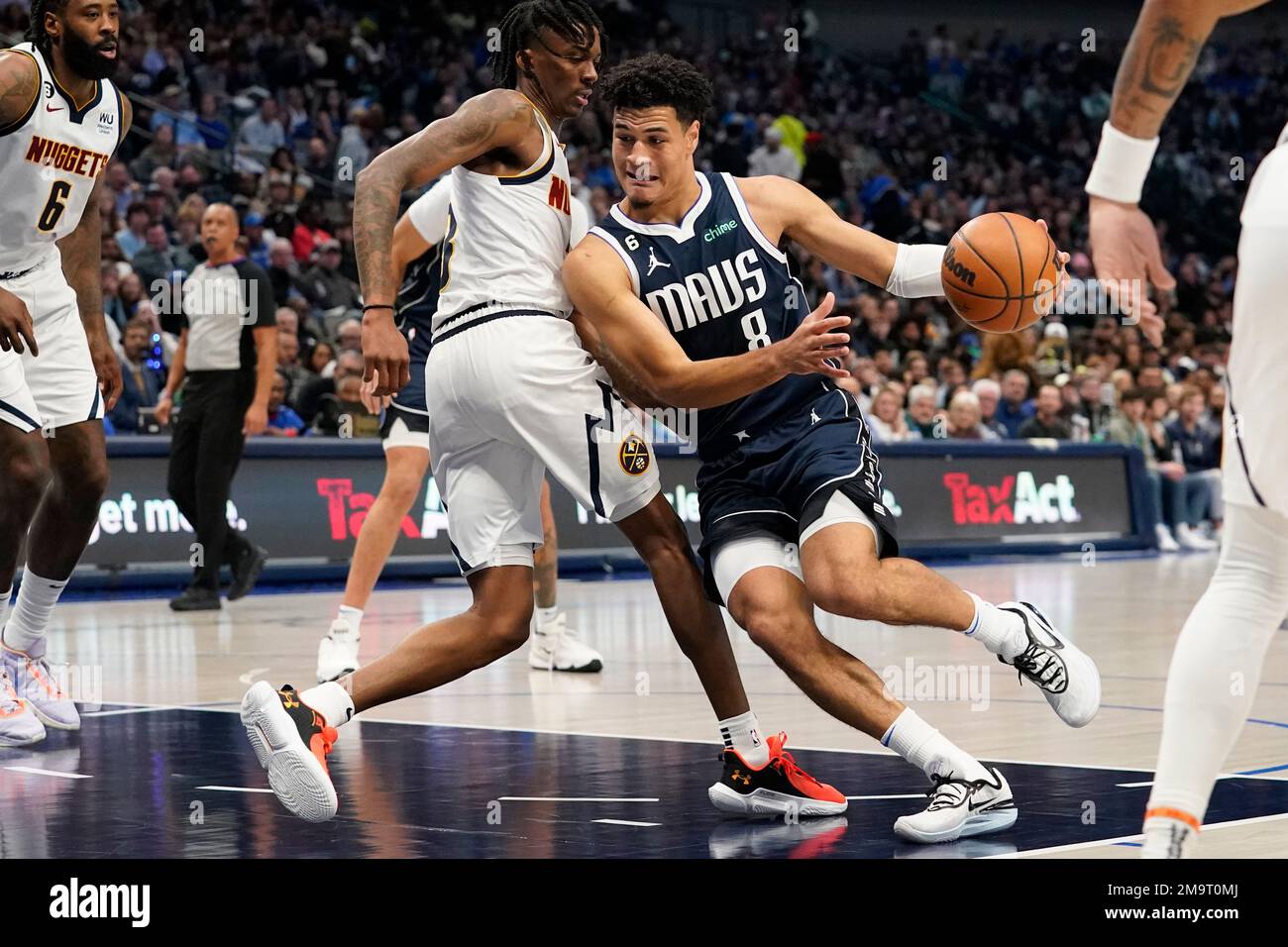 Dallas Mavericks guard Josh Green (8) drives against Denver Nuggets ...