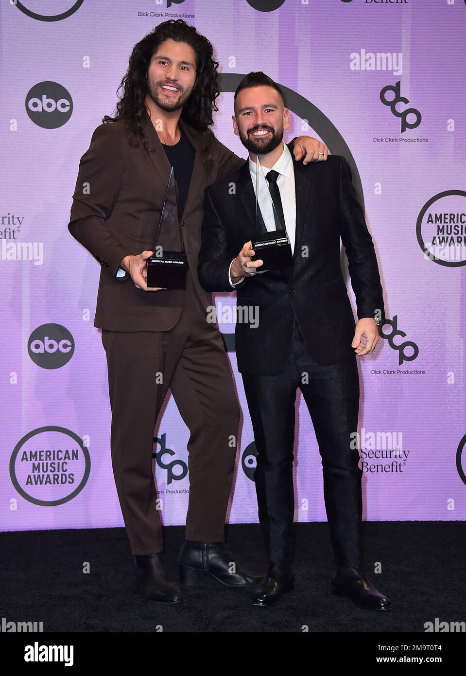 Dan Smyers, left, and Shay Mooney of Dan + Shay pose in the press room ...