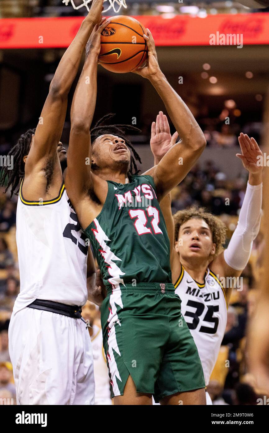 Mississippi Valley State's Michael Barber, center, shoots between Missouri's Aidan Shaw, left ...